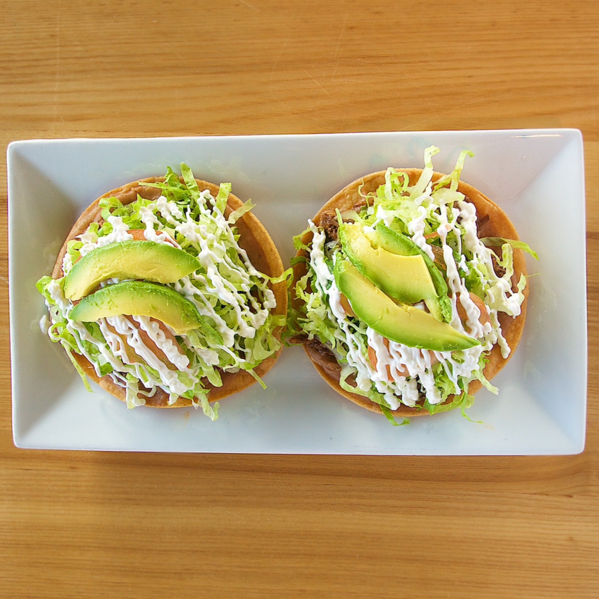 Birria Tostada | CALIFORNIA BURRITO